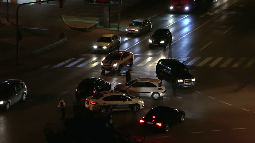 Traffic Police Officers Investigate A Road Traffic Accident At Night ...