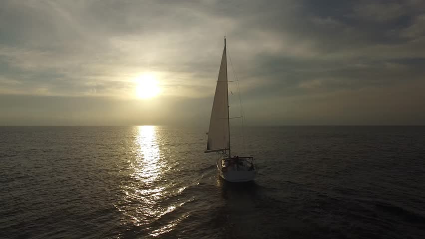 Sailboat In The Crisp Sea Storm At Sunset And Big Waves Stock Footage ...
