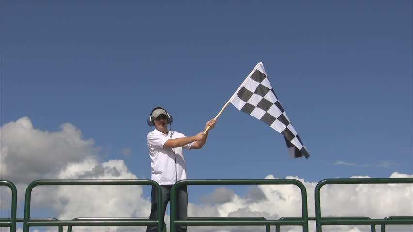 Waving Race Checkered Flag In Race Track Stock Footage Video 1339645 ...