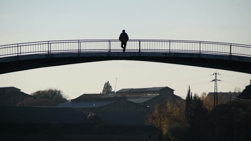 Man Standing On Bridge Stock Footage Video - Shutterstock