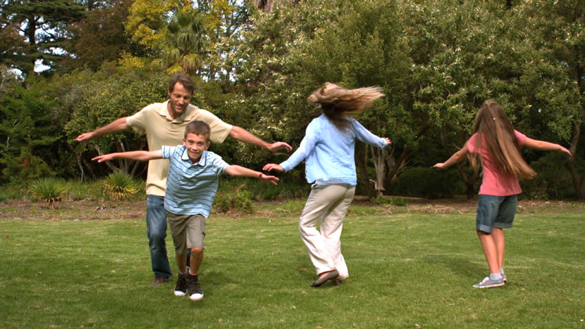 Parents Playing With Their Children In Slow Motion Stock Footage Video ...