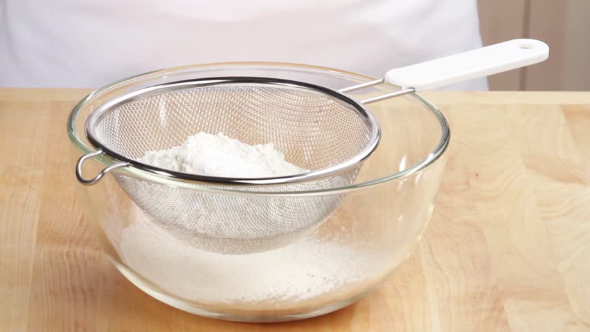 Sieving Flour Onto A Work Surface Stock Footage Video 4243883 ...