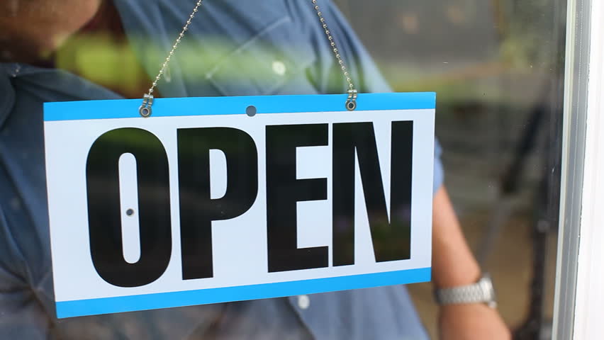 Business Owner Puts Open Sign In Window Stock Footage Video 4688210 ...