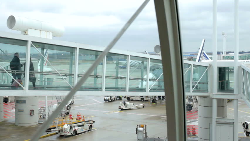Walking Jet Bridge â Airport Terminal To Airplane. Passengers Boarding ...