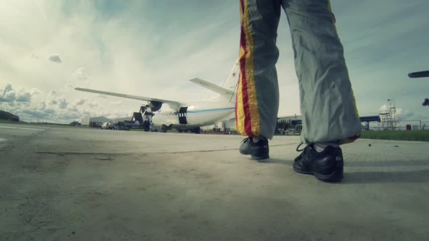 Aerodrome. A Woman Goes To The Plane That Would Bail Out. Stock Footage ...