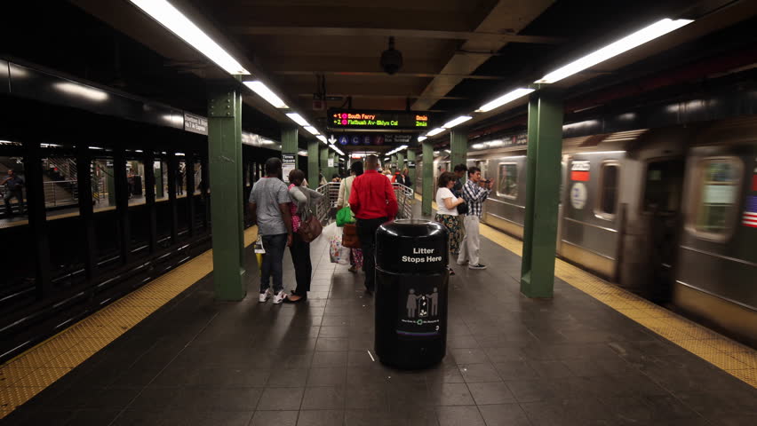 NEW YORK - AUGUST 7, 2014: MTA Subway Train Enters Station Platform In ...
