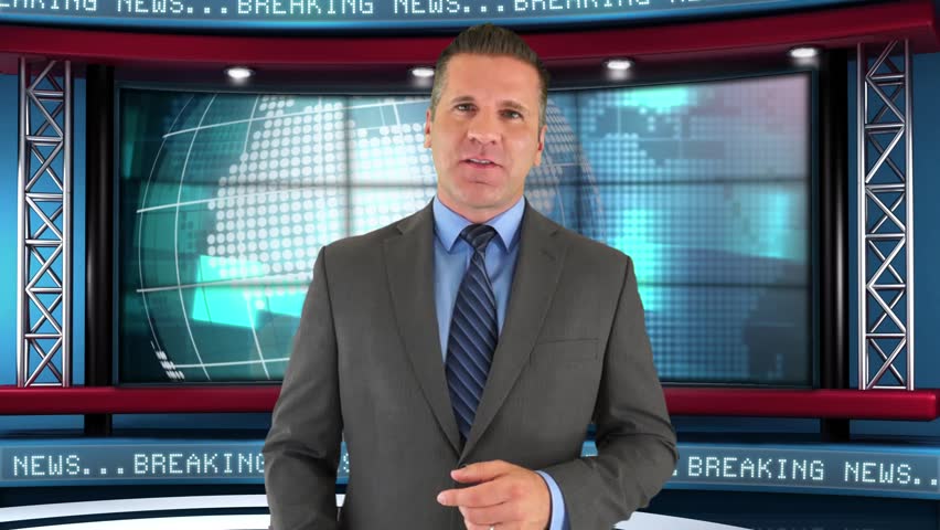 Reporter Sitting At A Desk In A Studio While Reporting The News ...