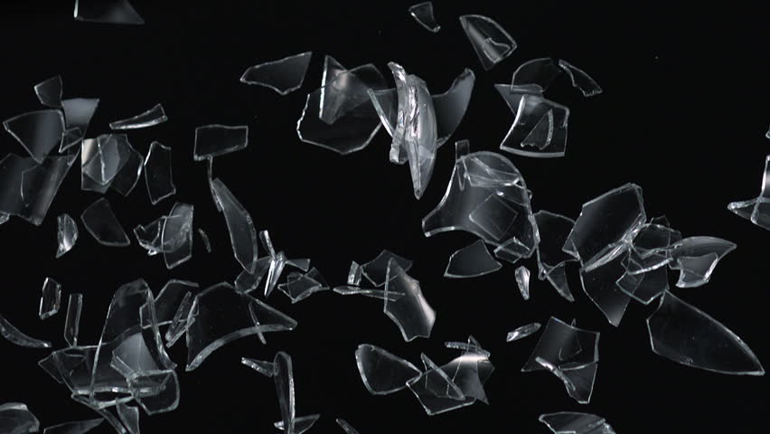 Broken Glasses Exploding Against Black Background. Shot With High Speed ...