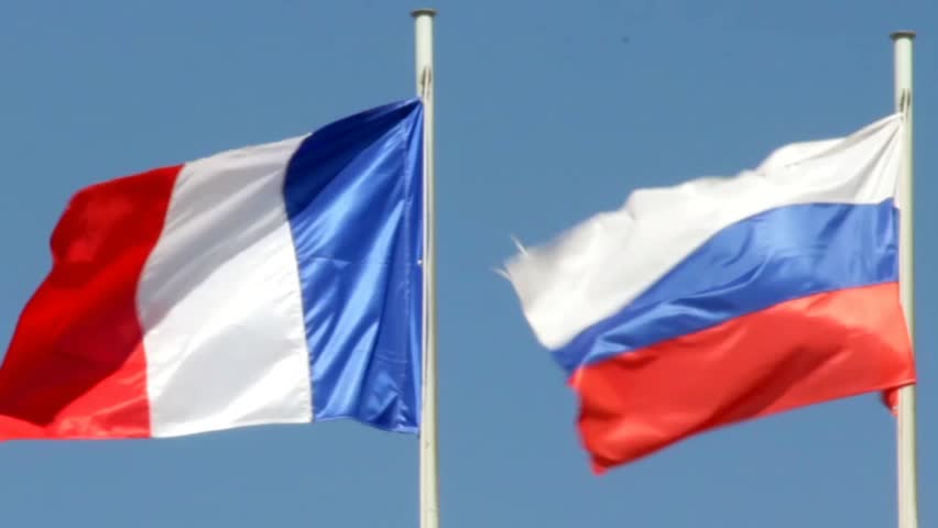 Flags Of France And Russia On Blue Sky Background Stock Footage Video ...