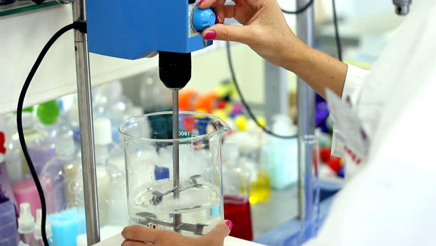 Laboratory Stirrer/Mixer. Chemist Working With Lab Mixer And Mixing ...