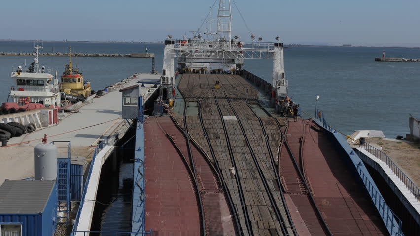KERCH, CRIMEA/RUSSIA NOVEMBER 12, 2014: Loading Of Railcars With Wagons ...